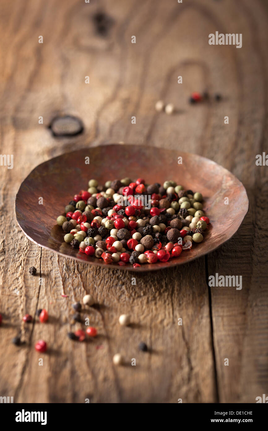 colorful pepper in copper bowl Stock Photo - Alamy