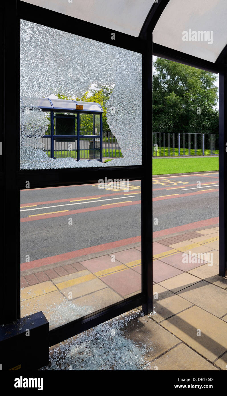 broken window in bus shelter Stock Photo - Alamy