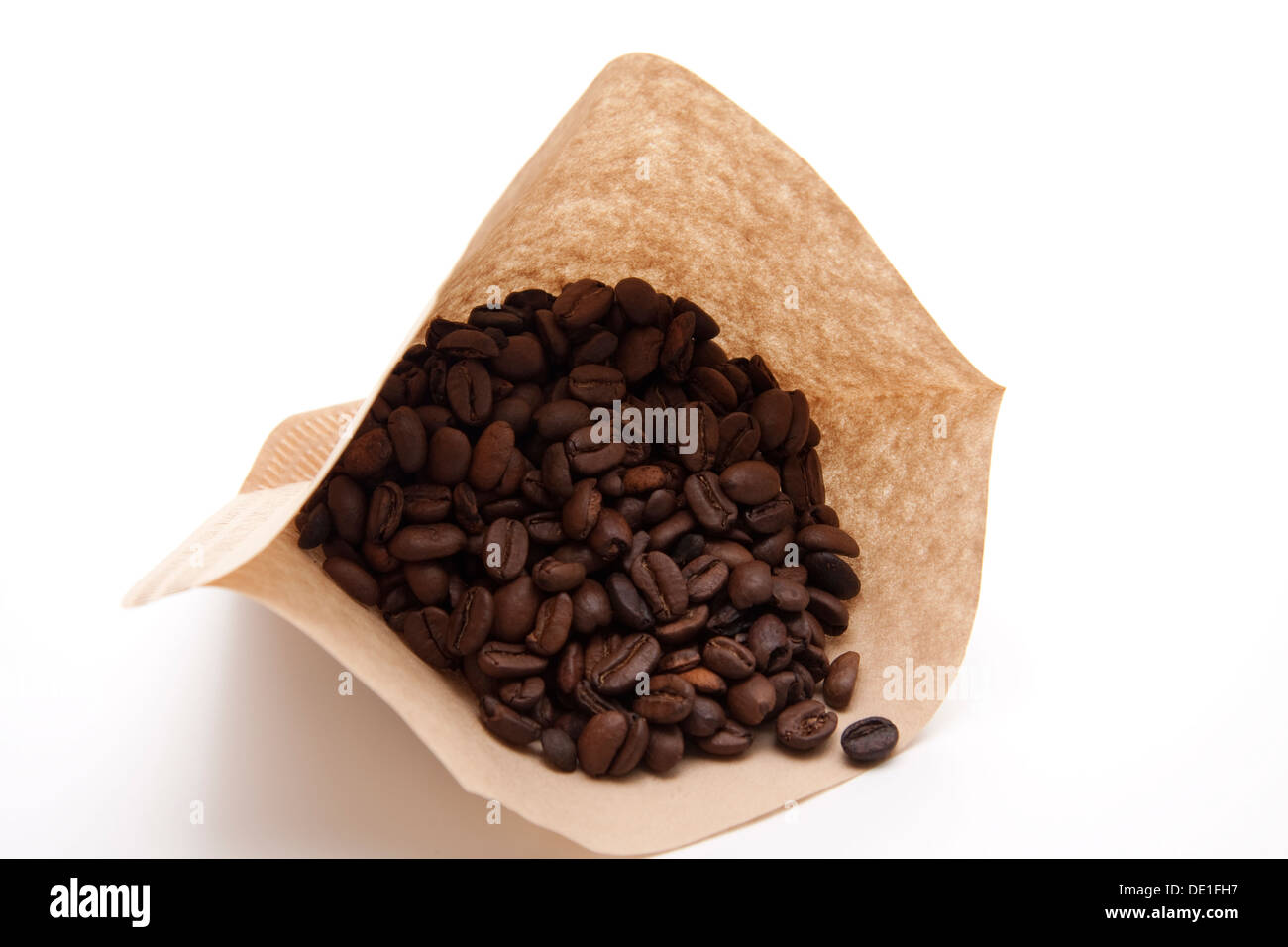 Coffee beans in filter paper Stock Photo - Alamy