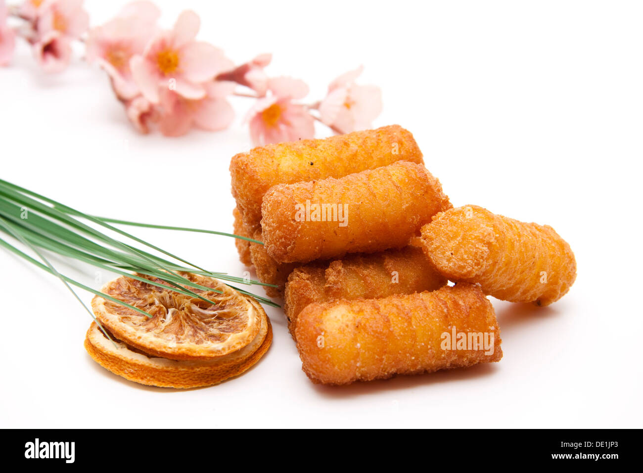 Croquettes with slices of orange Stock Photo - Alamy