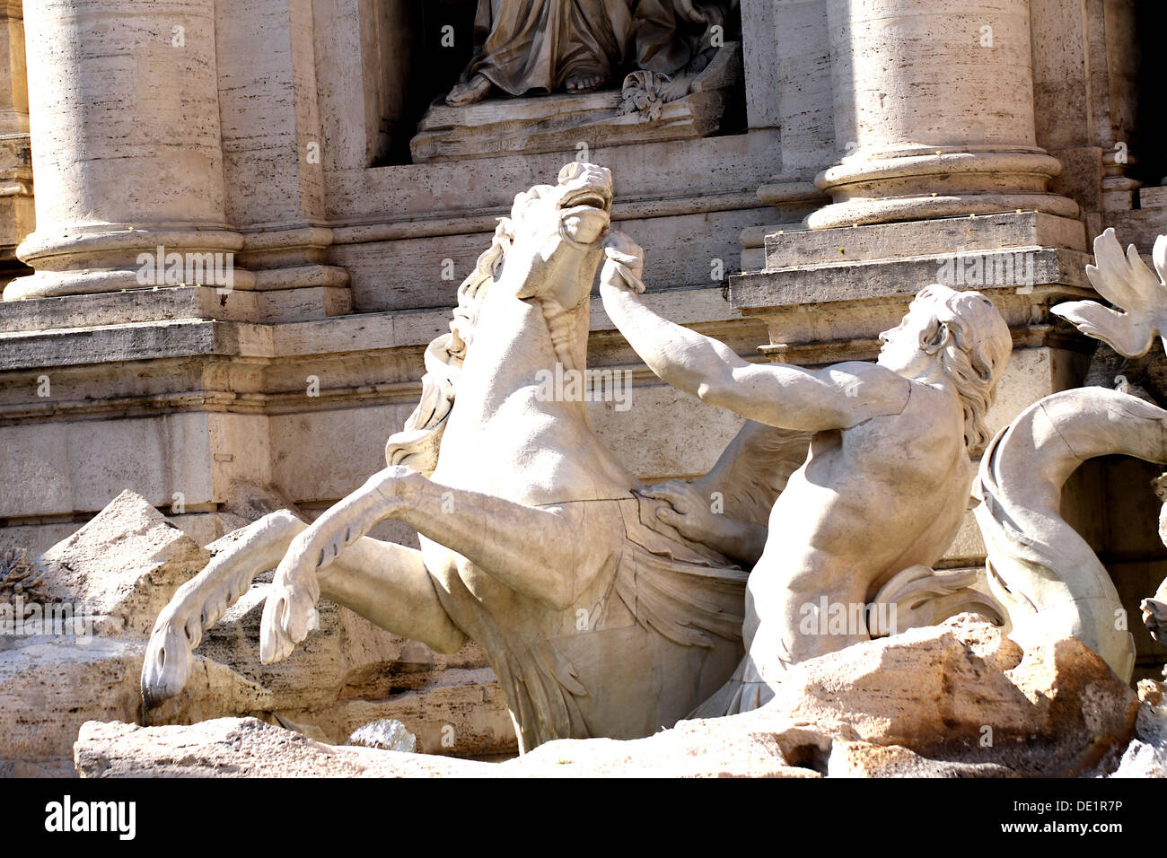 detail of the fountain of trevi in Rome with the runaway horse statue ...