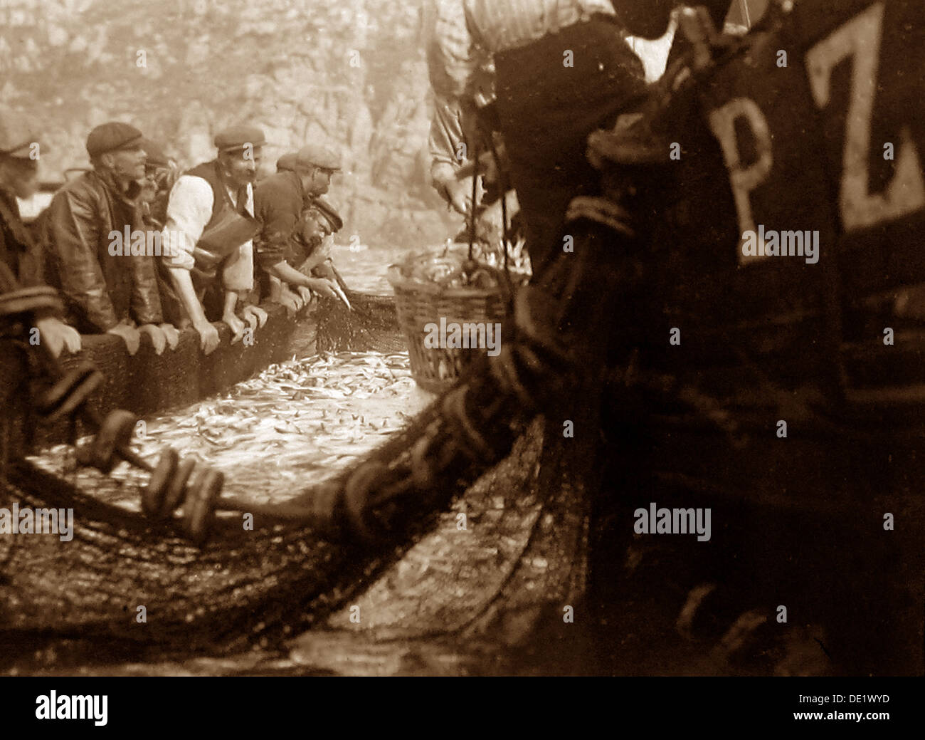 Pilchard Fishing in Cornwall using seine nets early 1900s Stock Photo ...
