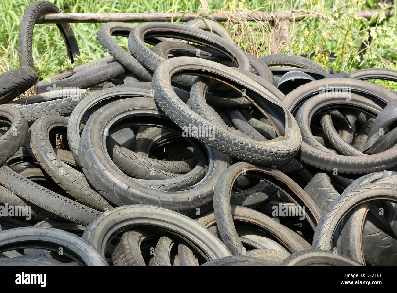 Motorcycle tires garbage stack Stock Photo - Alamy