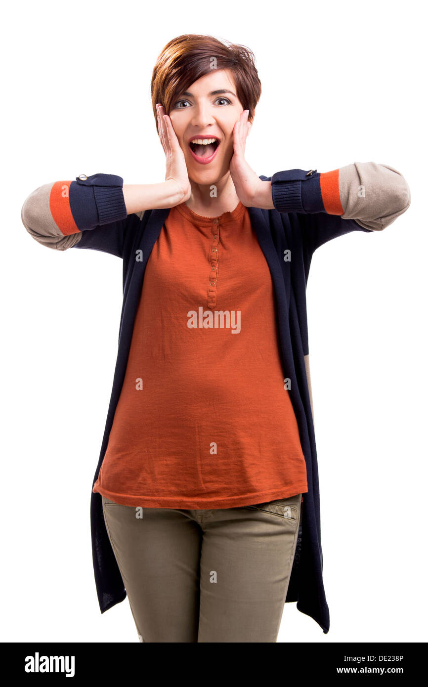 Beautiful woman with a astonished expression, isolated over a white ...