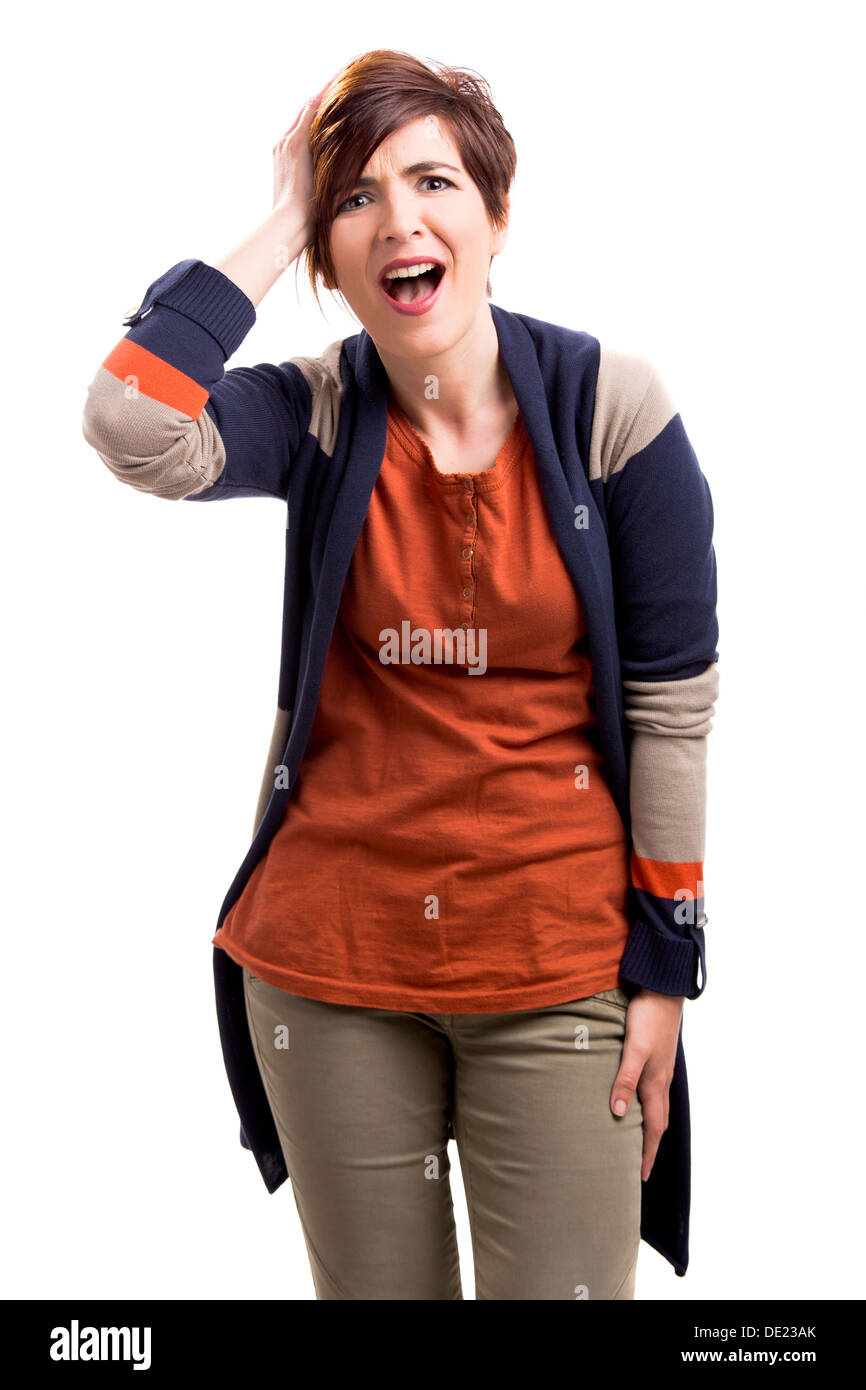 Portrait of a beautiful woman with a confused expression, isolated over ...