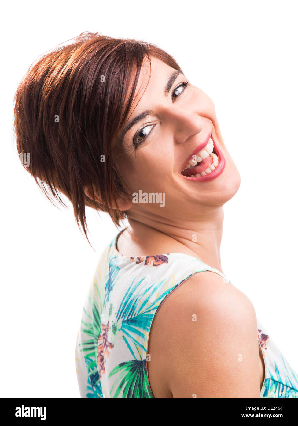 Portrait of a beautiful woman looking back and smiling, isolated over a ...