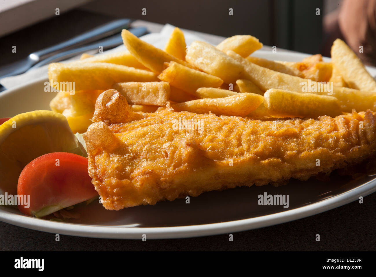 Battered Fish Chips and Peas Stock Photo - Alamy