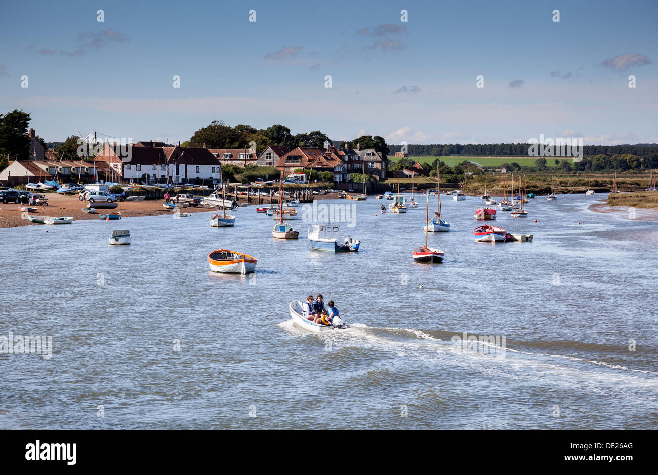Boaters entering the safe harbour at Burnham Overy Staithe, near ...
