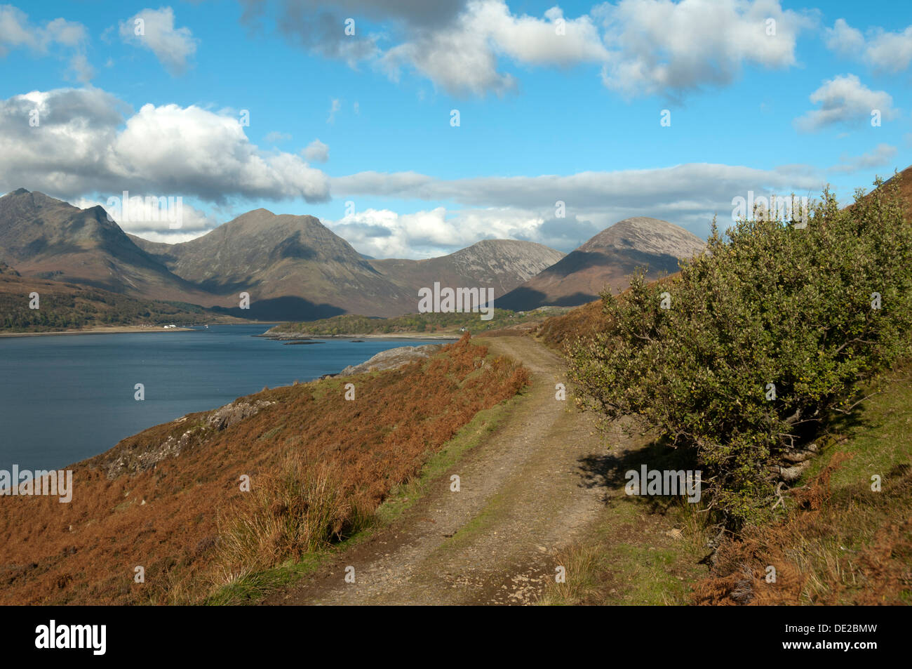 The Red Cuillin hills range over Loch Slapin from the coastal track to ...