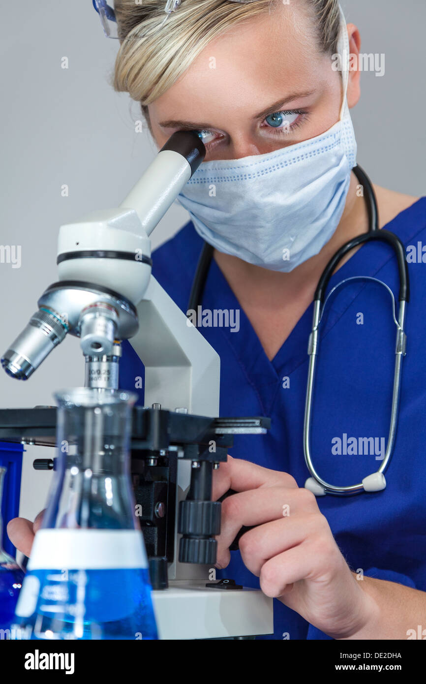 Person using surgical mask hi-res stock photography and images - Alamy