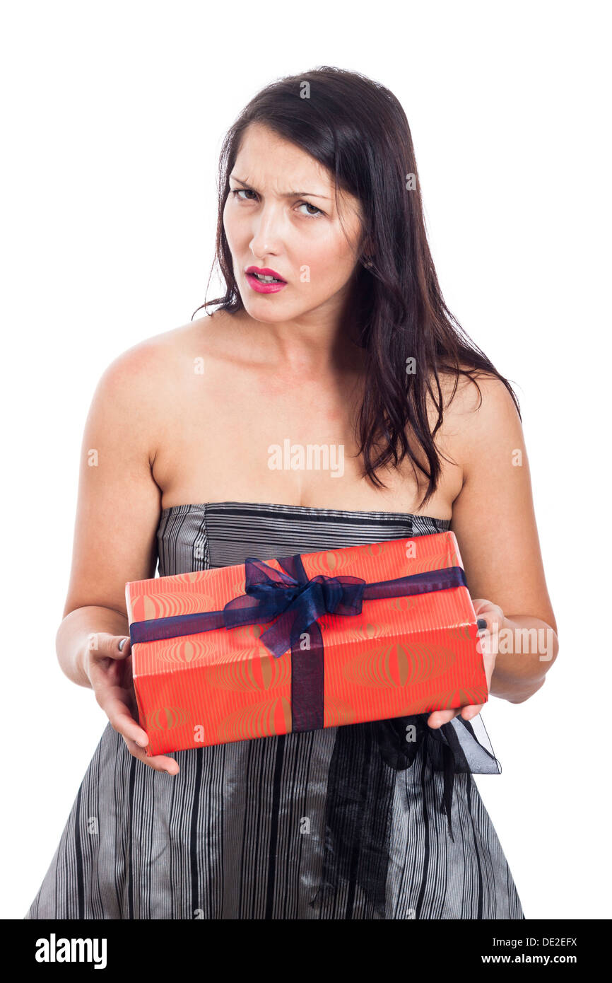 Angry disappointed woman holding present, isolated on white background ...