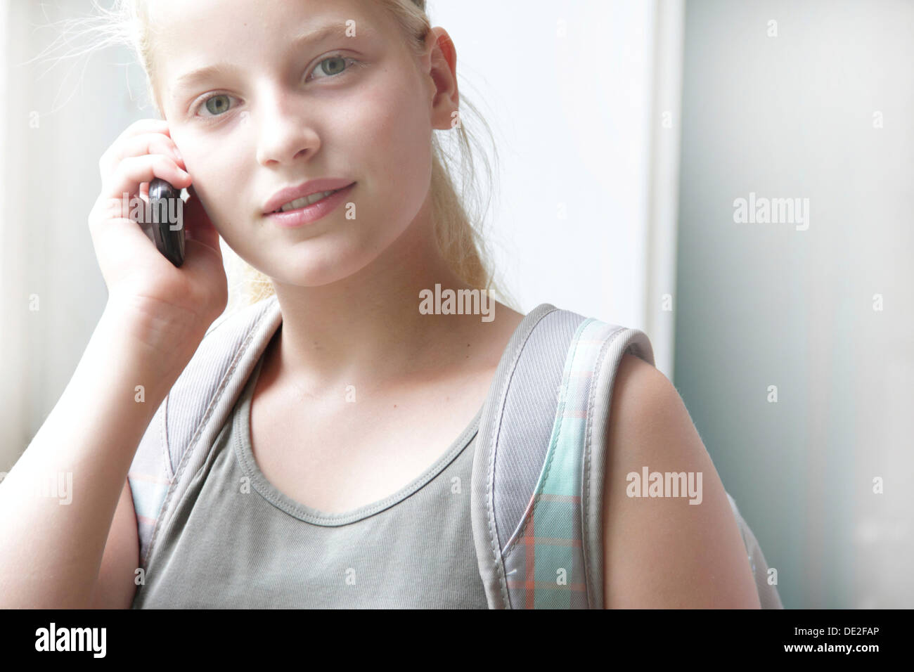 Girl talking on a mobile phone Stock Photo - Alamy