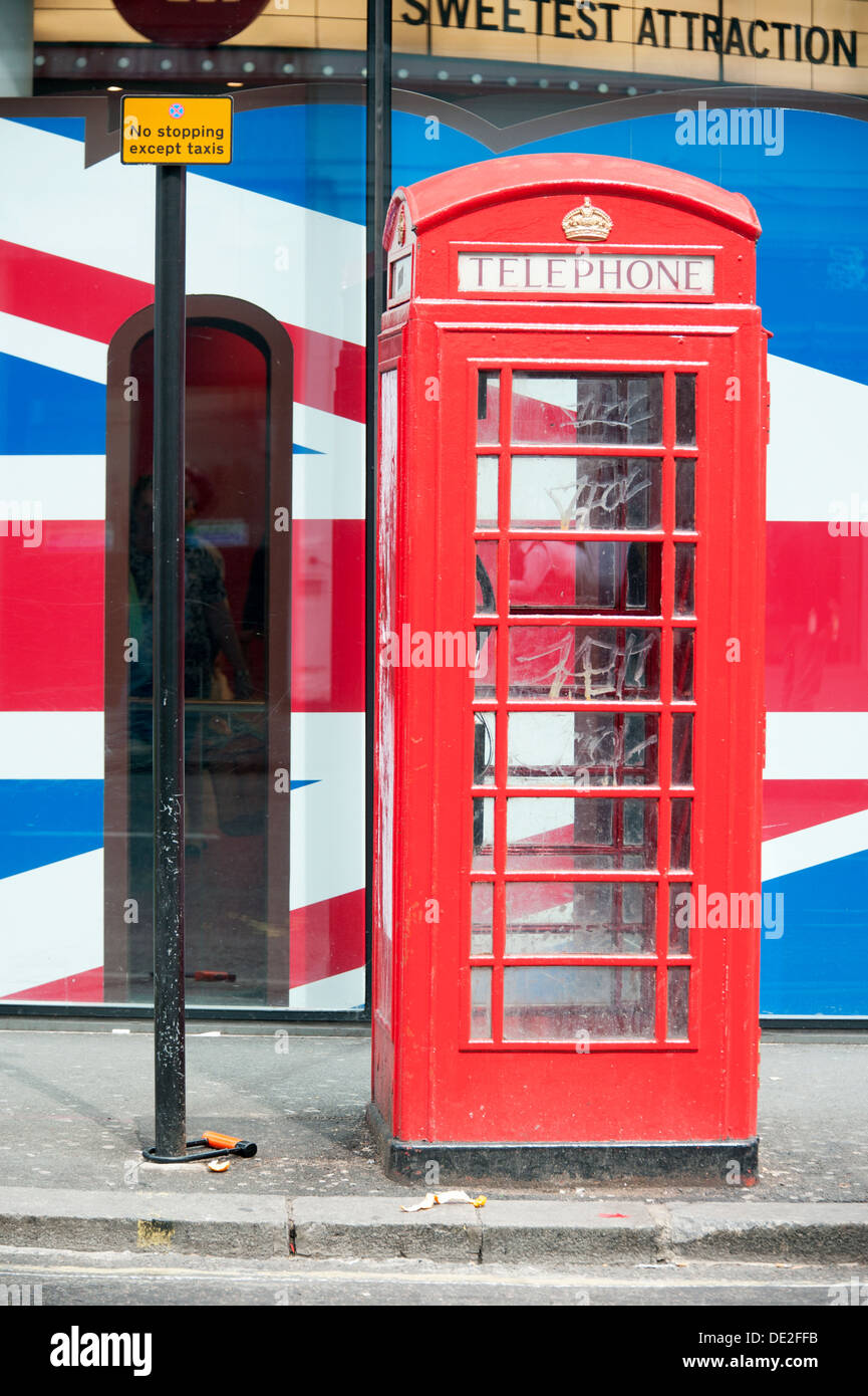 red phone box, union jack shop window Stock Photo - Alamy
