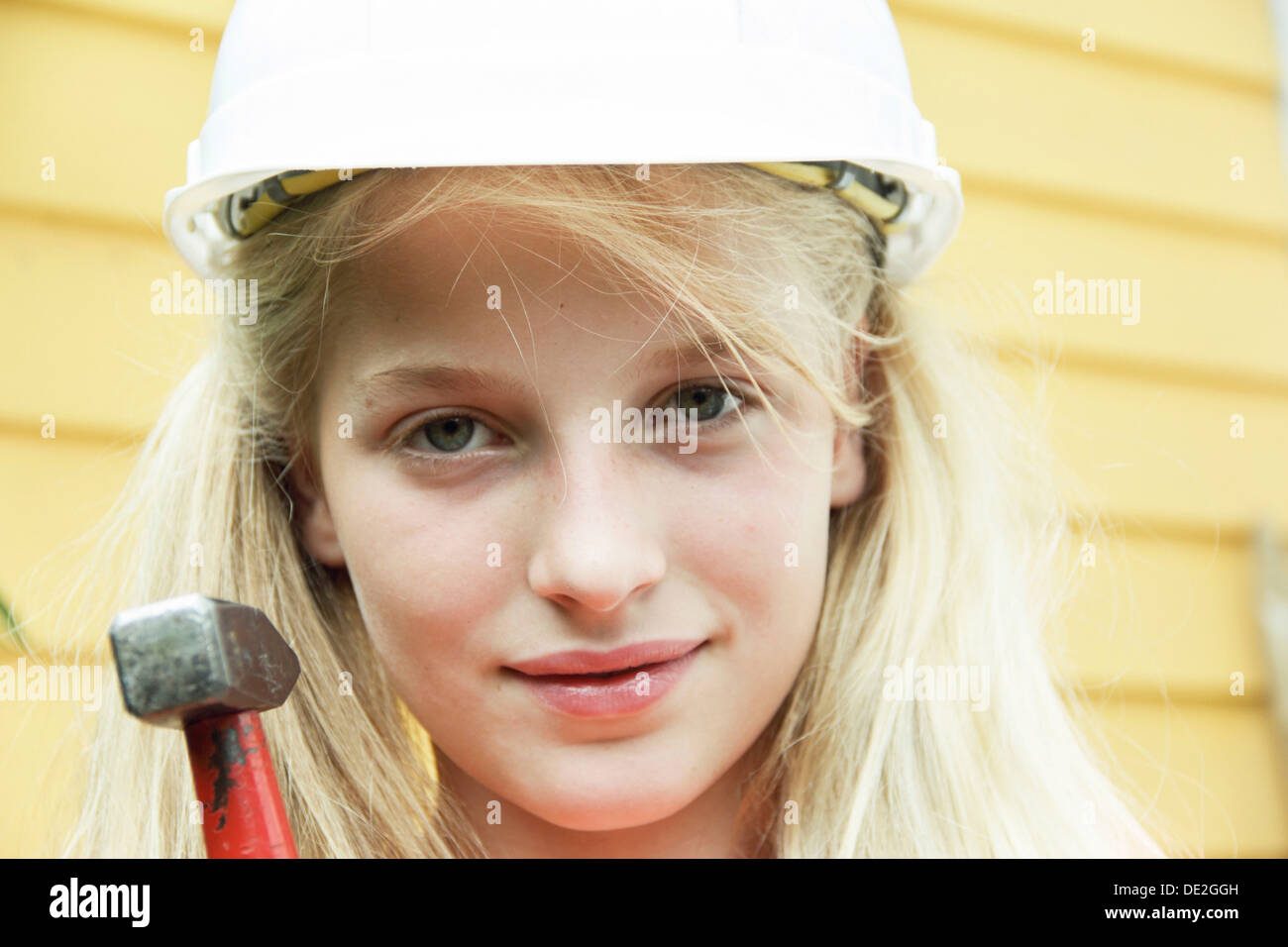 Girl dressed up as a construction worker Stock Photo - Alamy