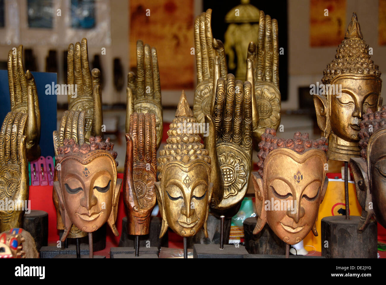 Souvenirs, masks, Buddhas, face, hand, Vientiane, Laos, Southeast Asia ...