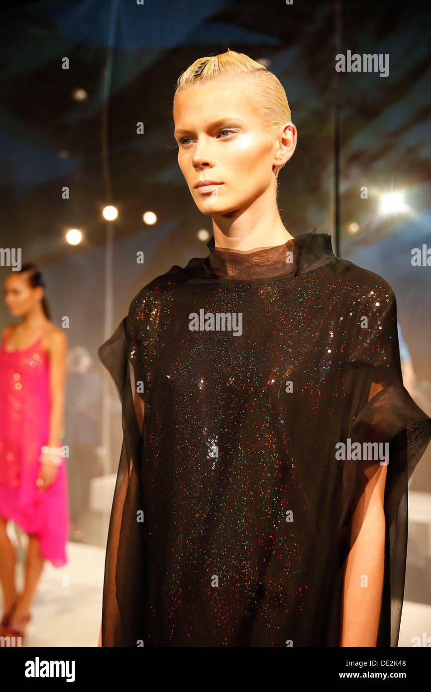 New York, NY, USA. 9th Sept, 2013. Models wear the dress designs of ...