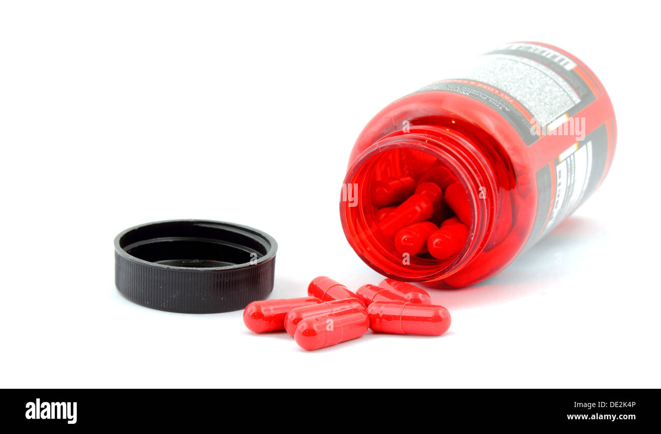 Red capsules hi-res stock photography and images - Alamy