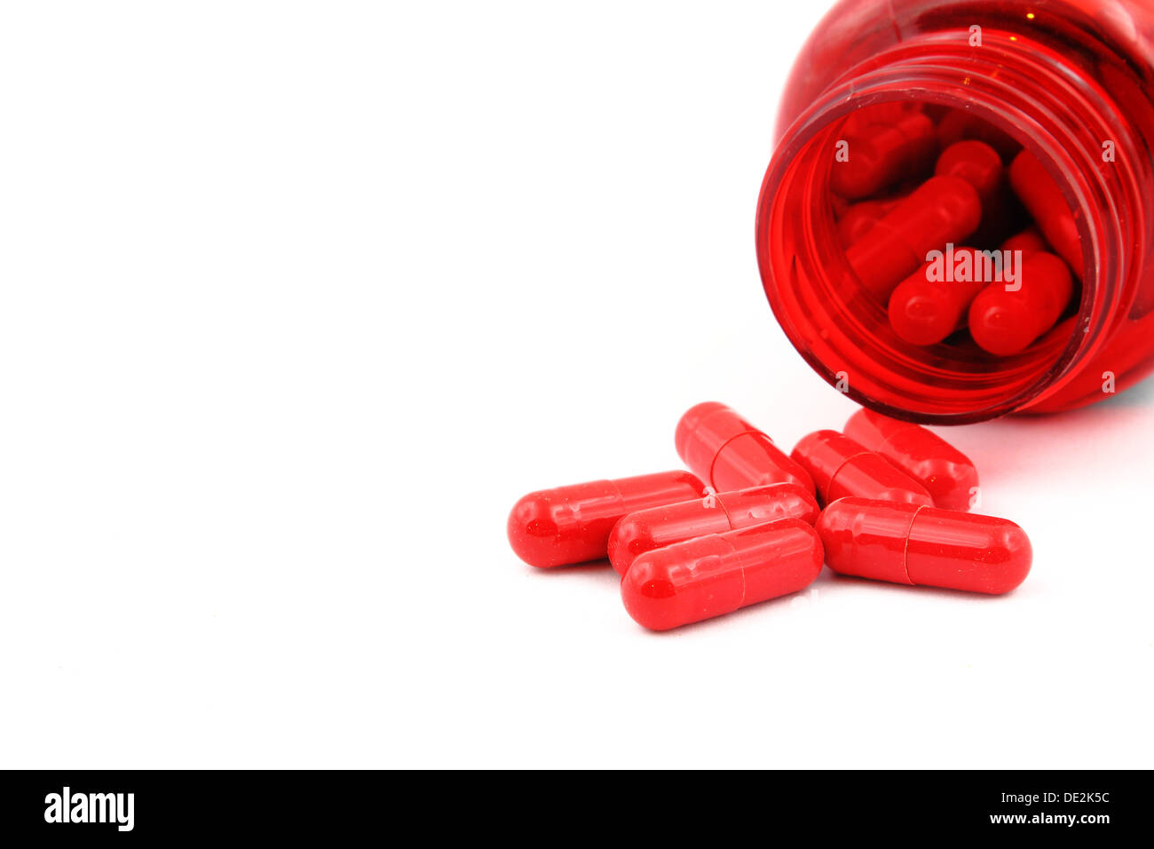 Red capsules hi-res stock photography and images - Alamy