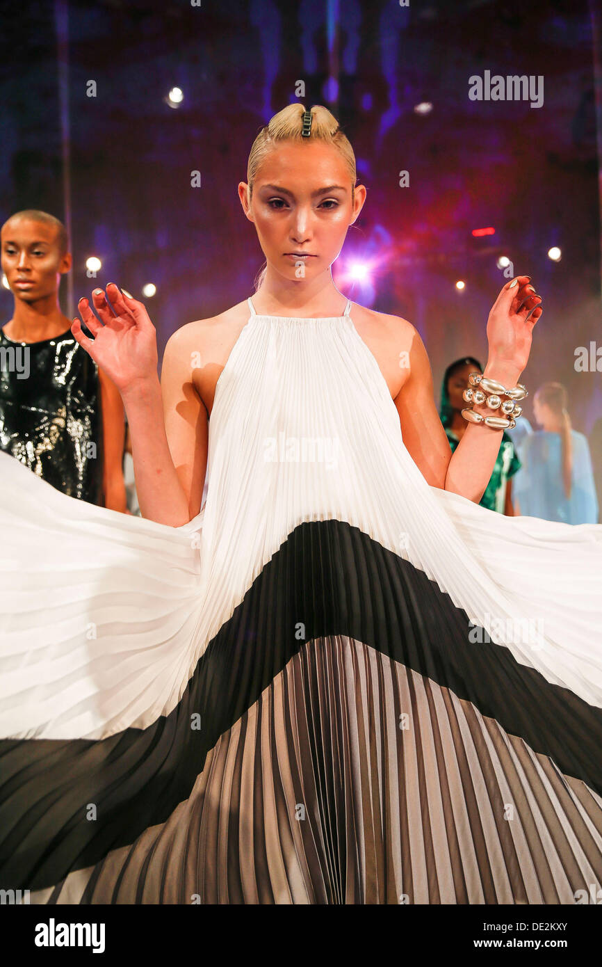 New York, NY, USA. 9th Sept, 2013. Models wear the dress designs of ...