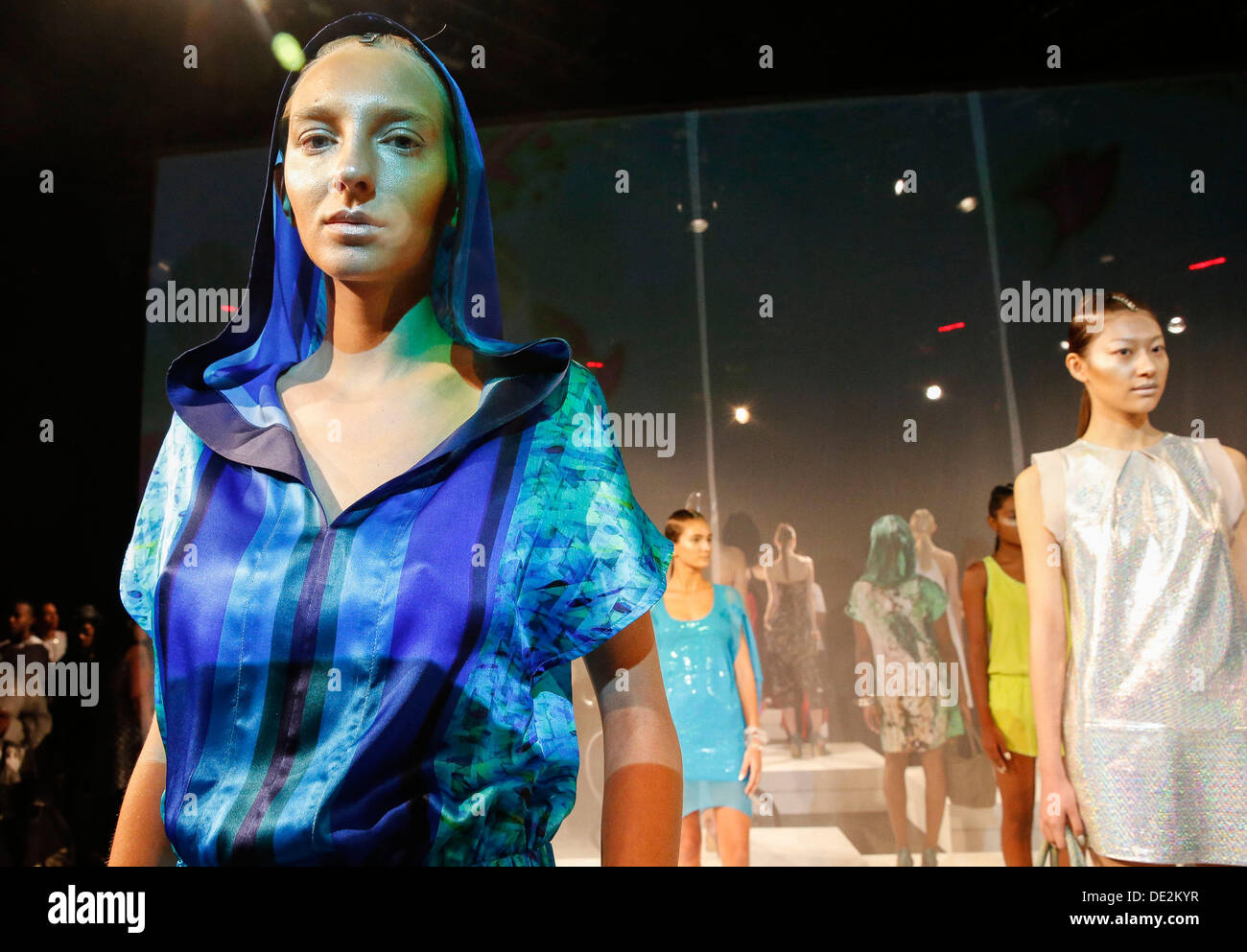 New York, NY, USA. 9th Sept, 2013. Models wear the dress designs of ...