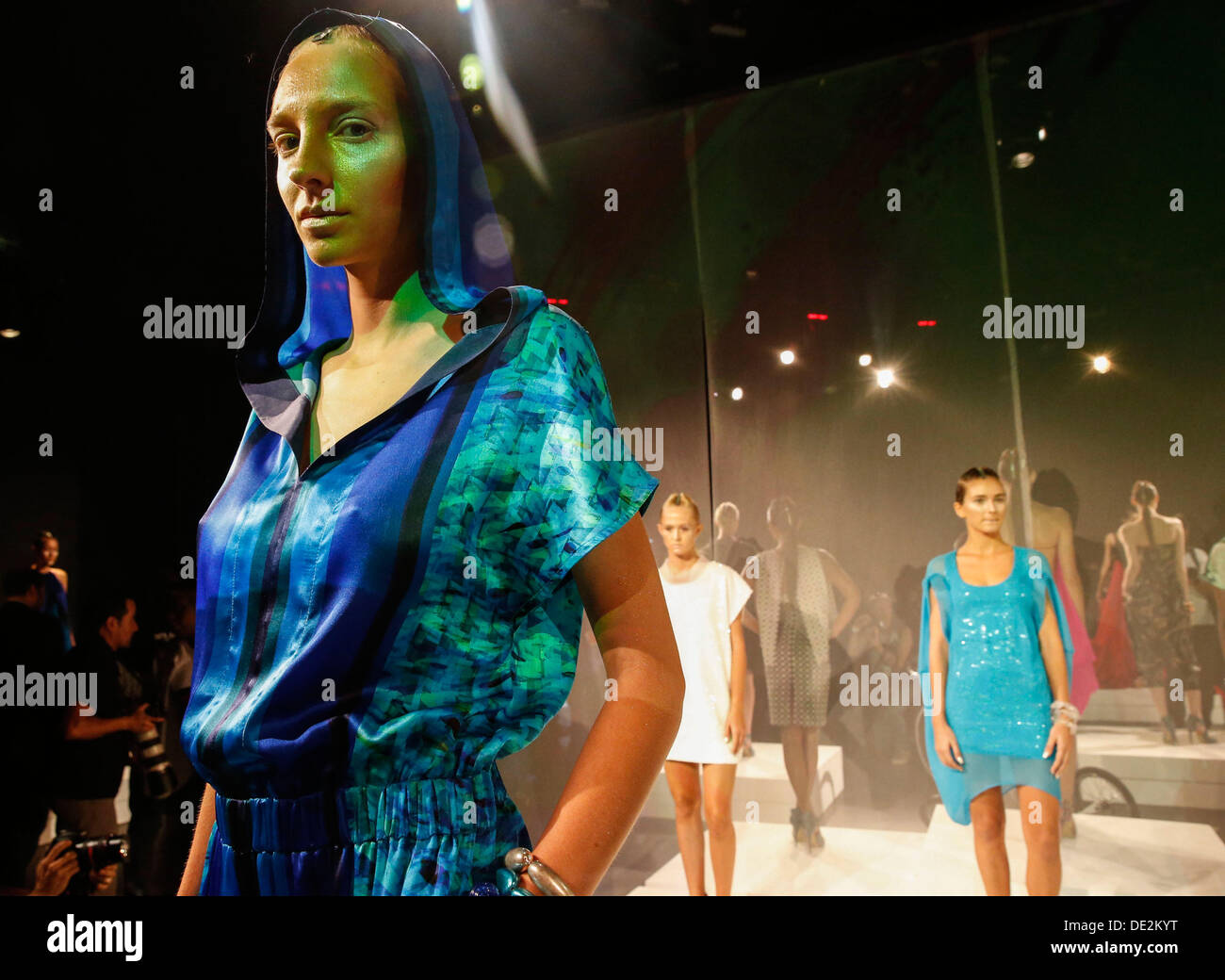 New York, NY, USA. 9th Sept, 2013. Models wear the dress designs of ...