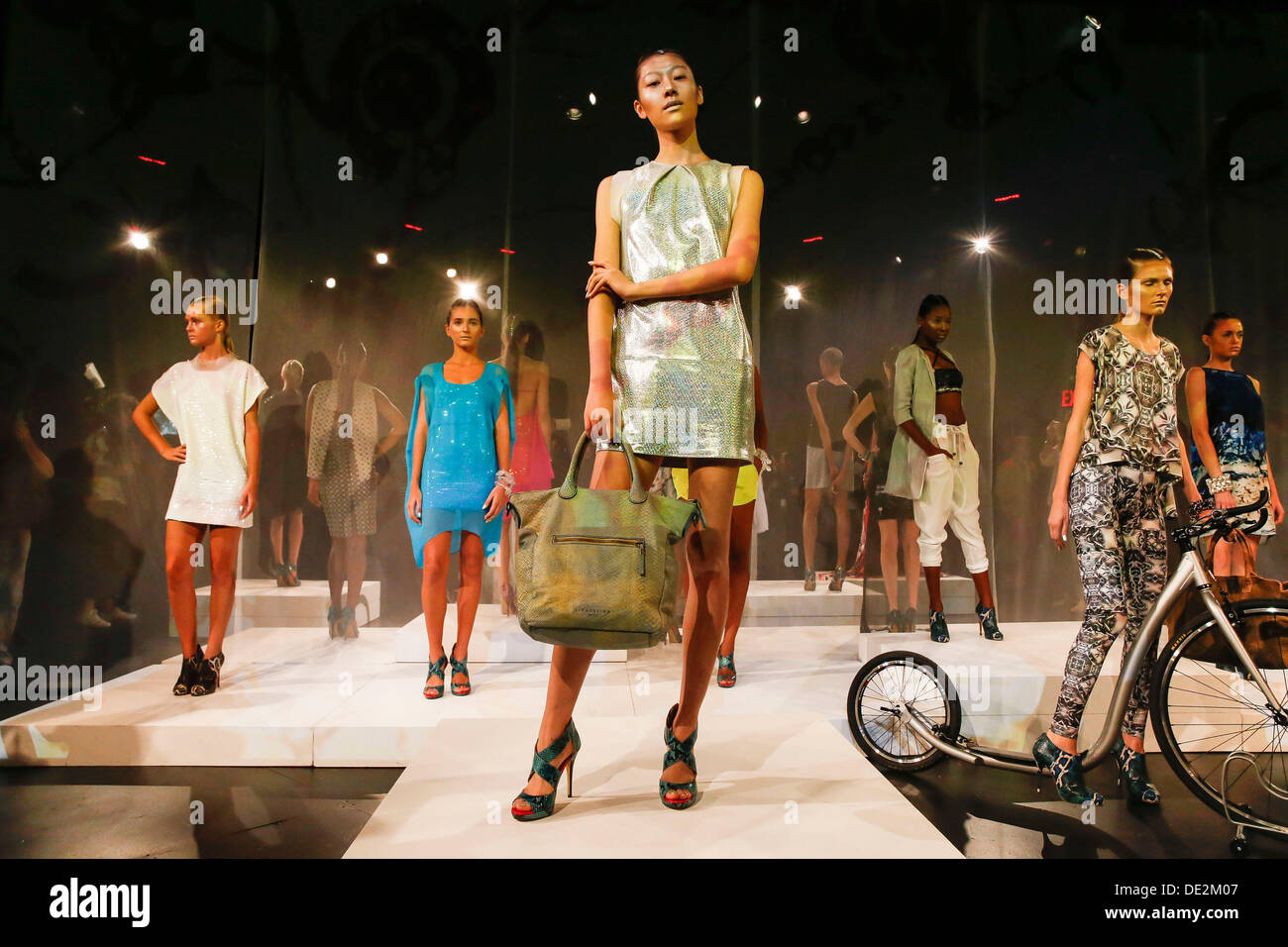 New York, NY, USA. 9th Sept, 2013. Models wear the dress designs of ...