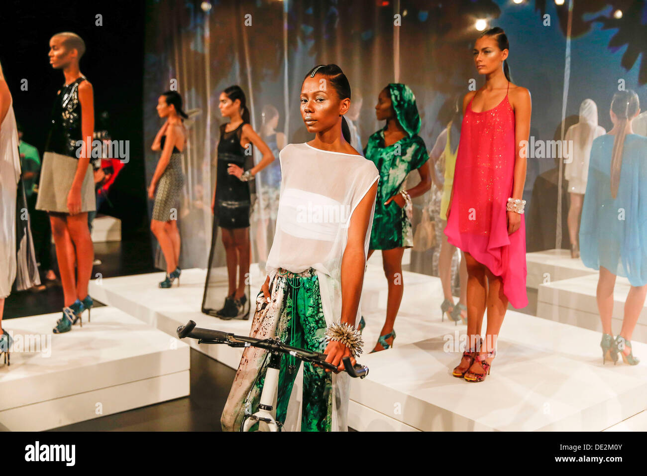 New York, NY, USA. 9th Sept, 2013. Models wear the dress designs of ...
