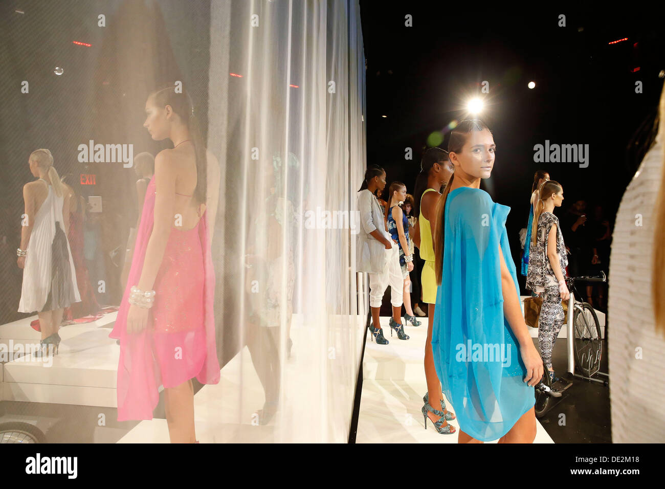 New York, NY, USA. 9th Sept, 2013. Models wear the dress designs of ...