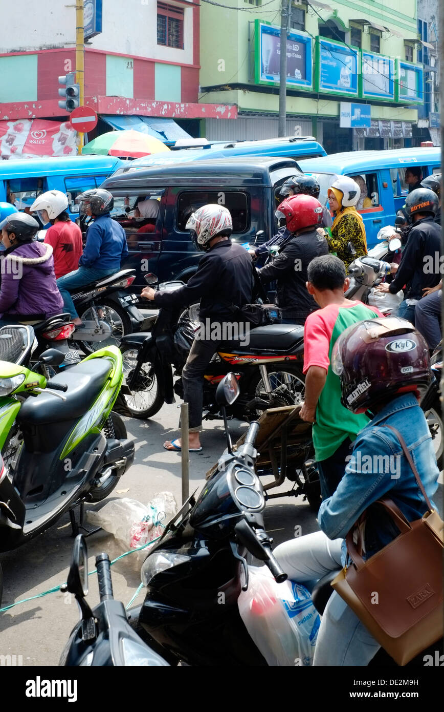 chaotic street scene as masses of people start to travel to families ...