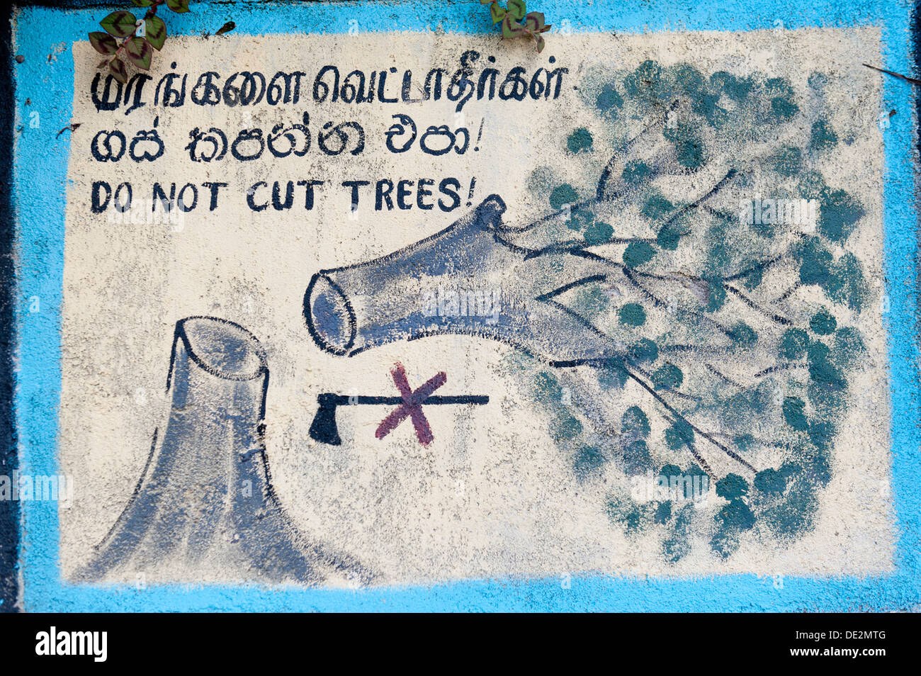 Environmental protection, painted sign, "Do not cut trees" depicting a ...