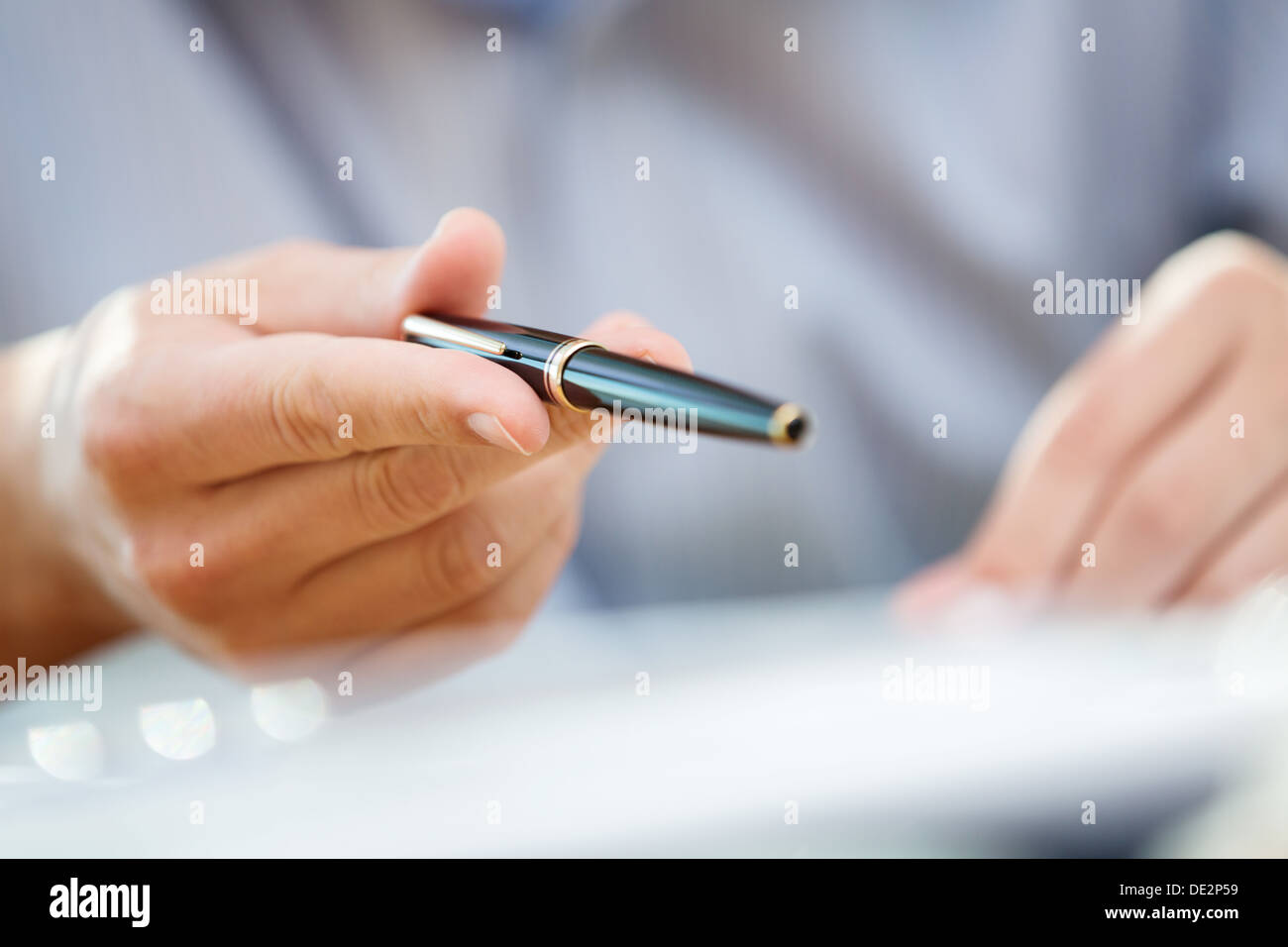 Man's hand making accent gesture or pointing at something with a black ...
