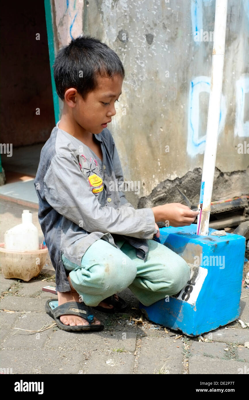 very young children playing with fireworks unsupervised in a village ...