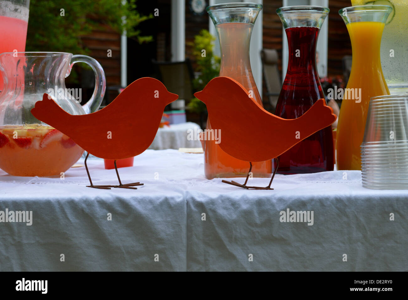 Bird love at buffet Stock Photo - Alamy