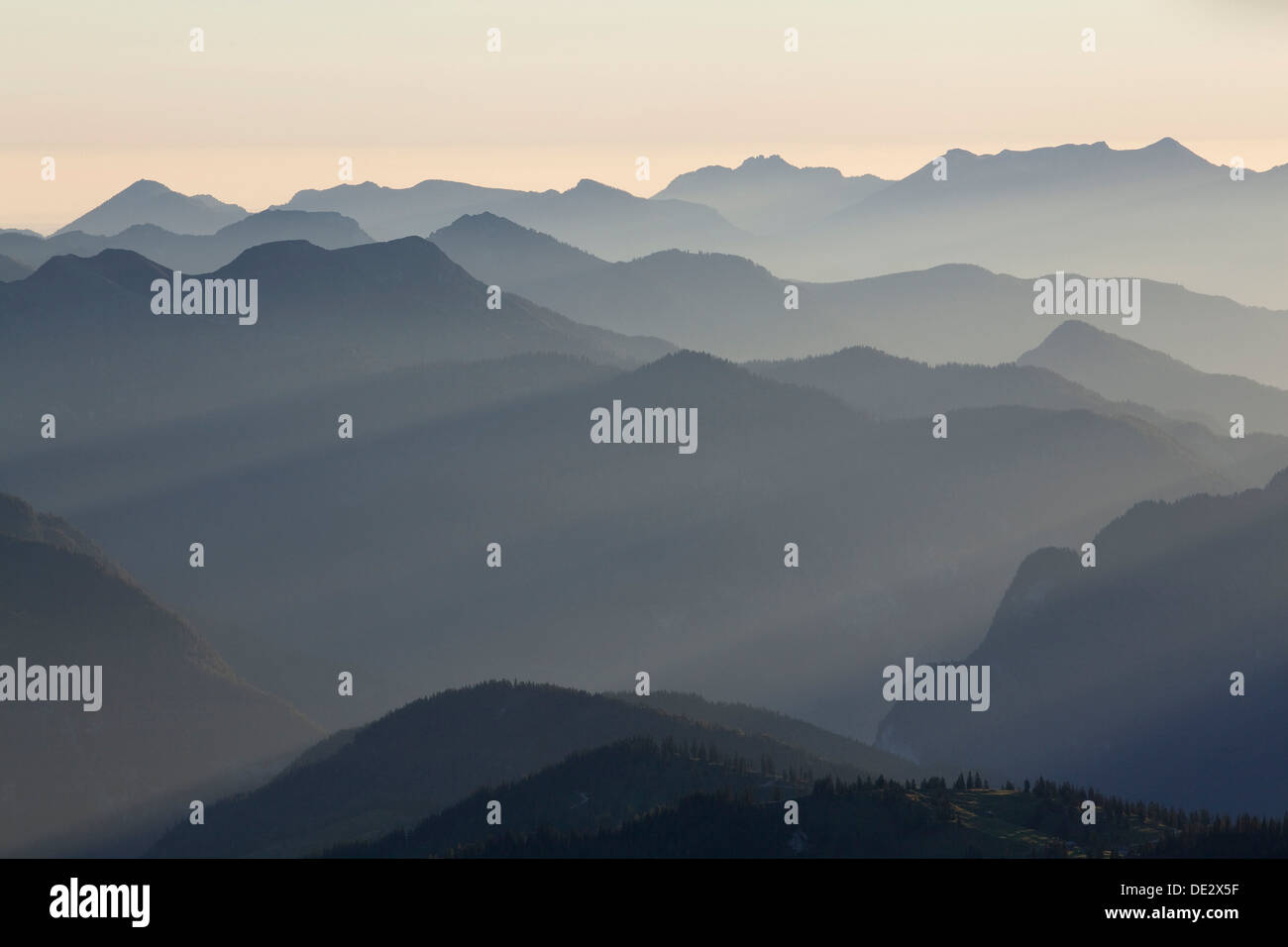 Backlit mountain ridges seen from Hochiss Mountain in Rofan, Maurach ...