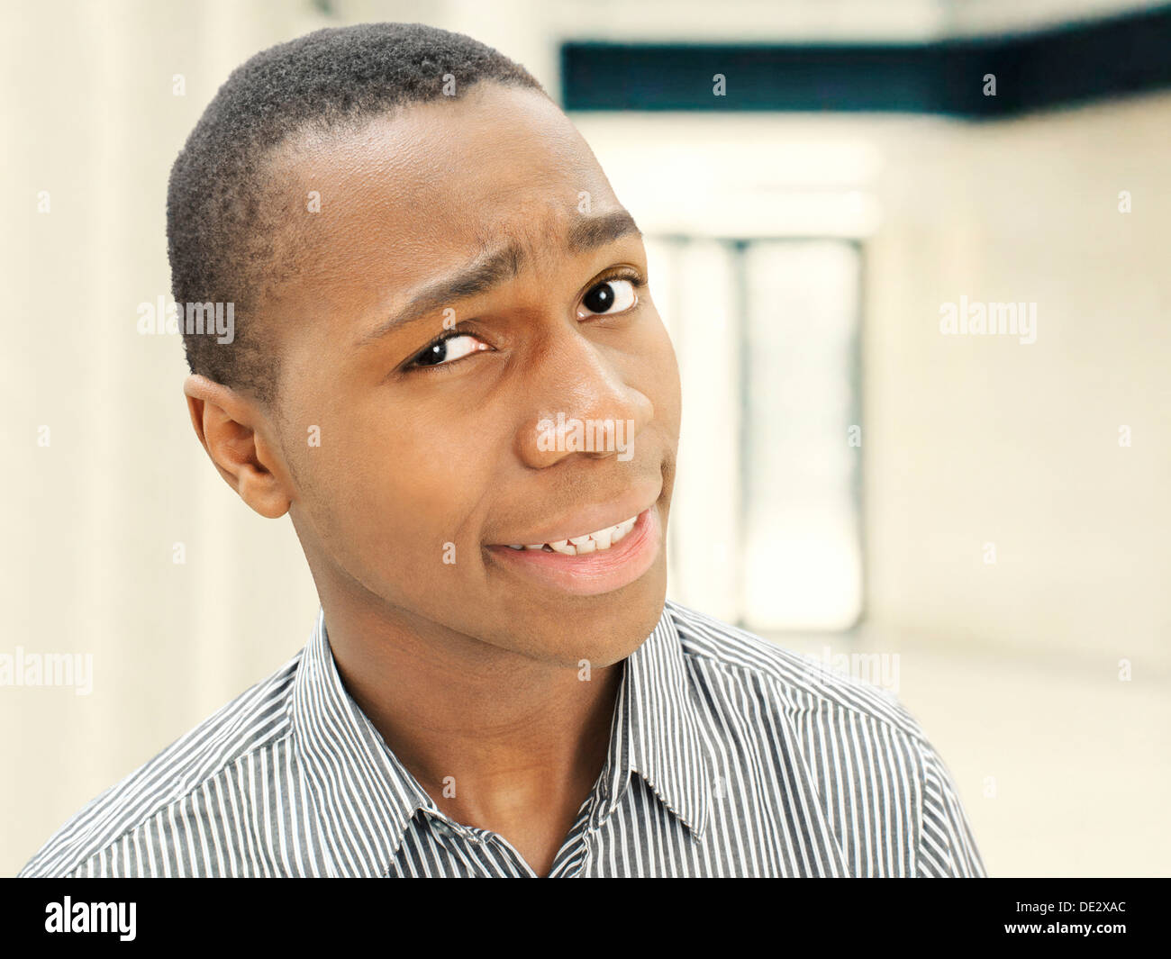 Skeptical african man being doubtful hi-res stock photography and ...