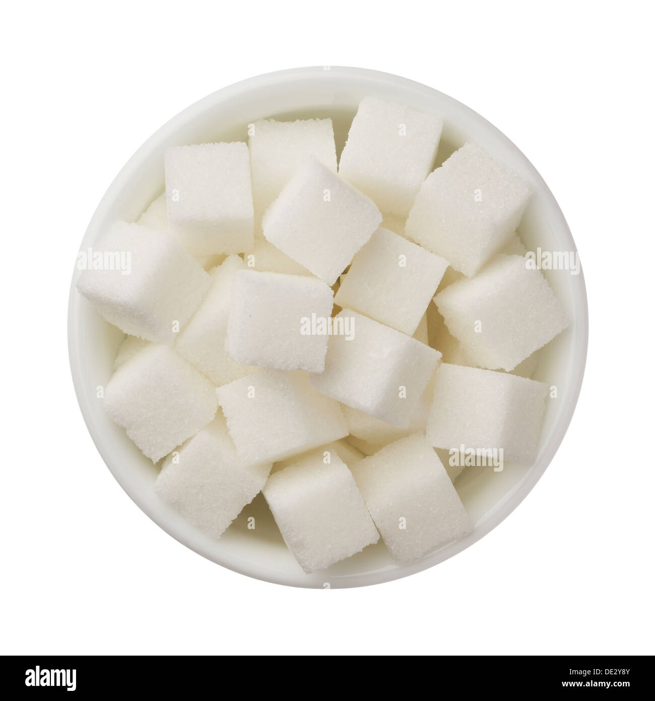 Sugar cubes in a bowl isolated on white background Stock Photo - Alamy