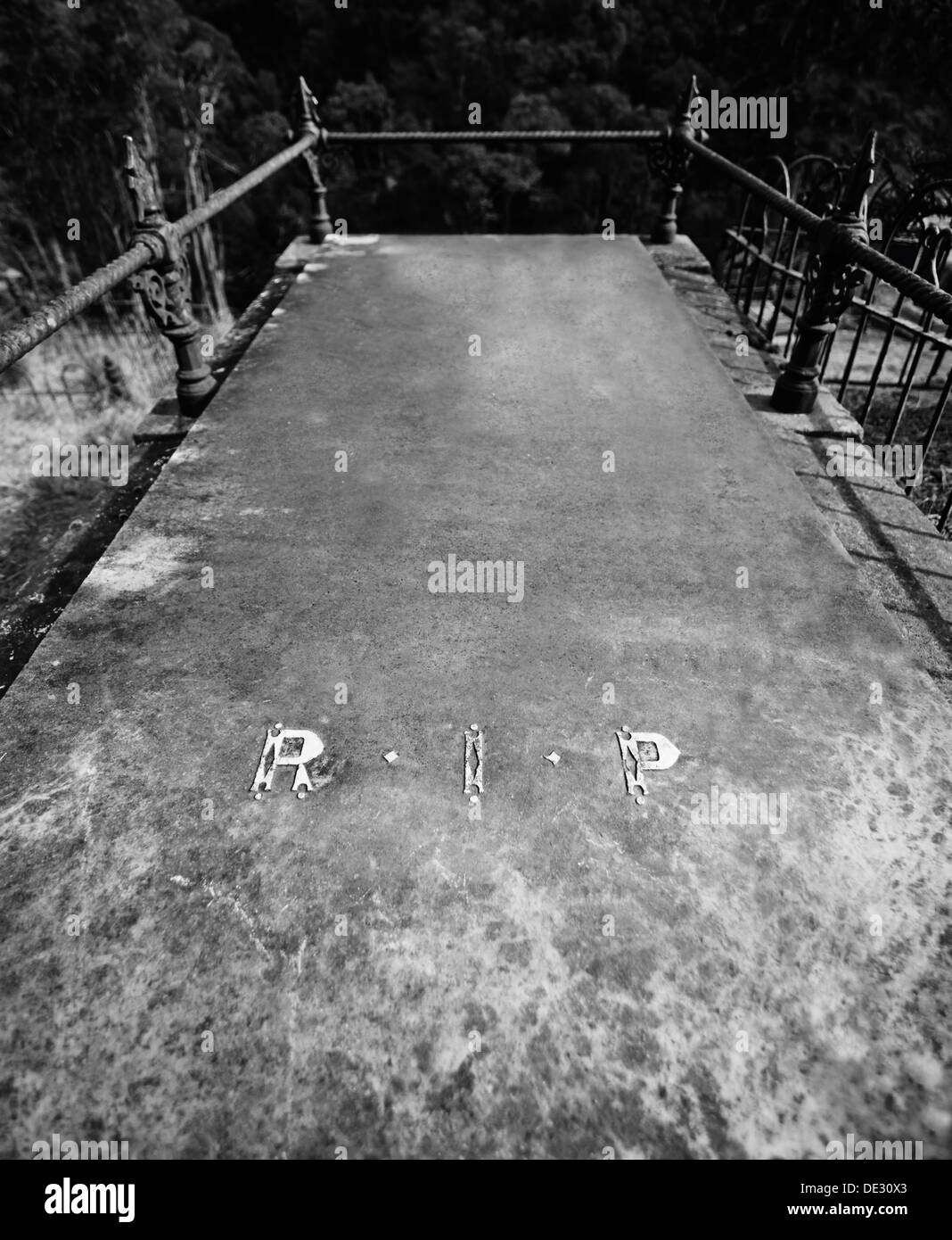 Old grave site with R.I.P engraved Stock Photo - Alamy