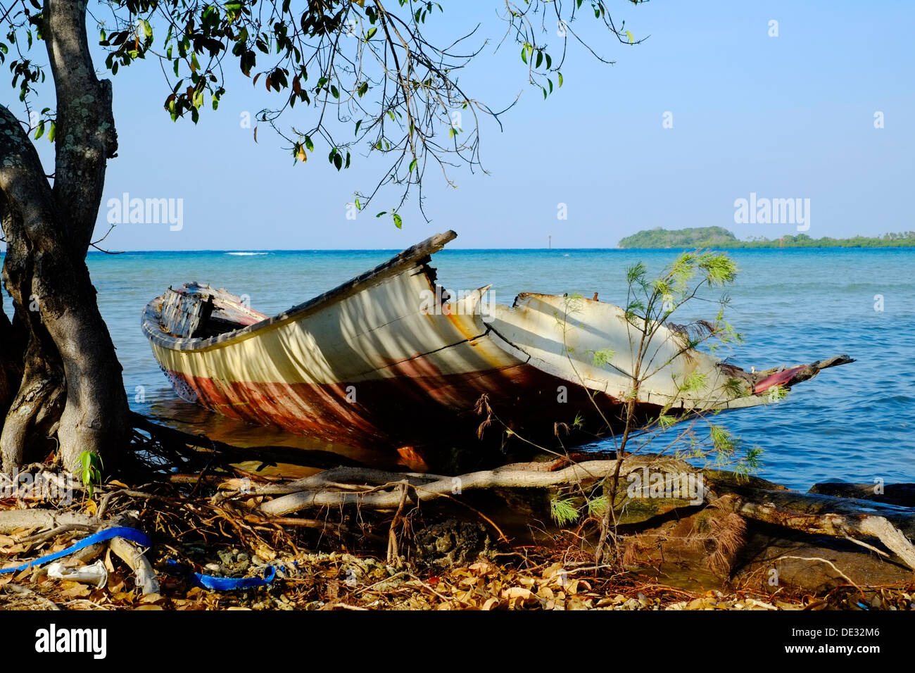 abandoned and derelict traditional fishing boat on a beach karimunjawa ...