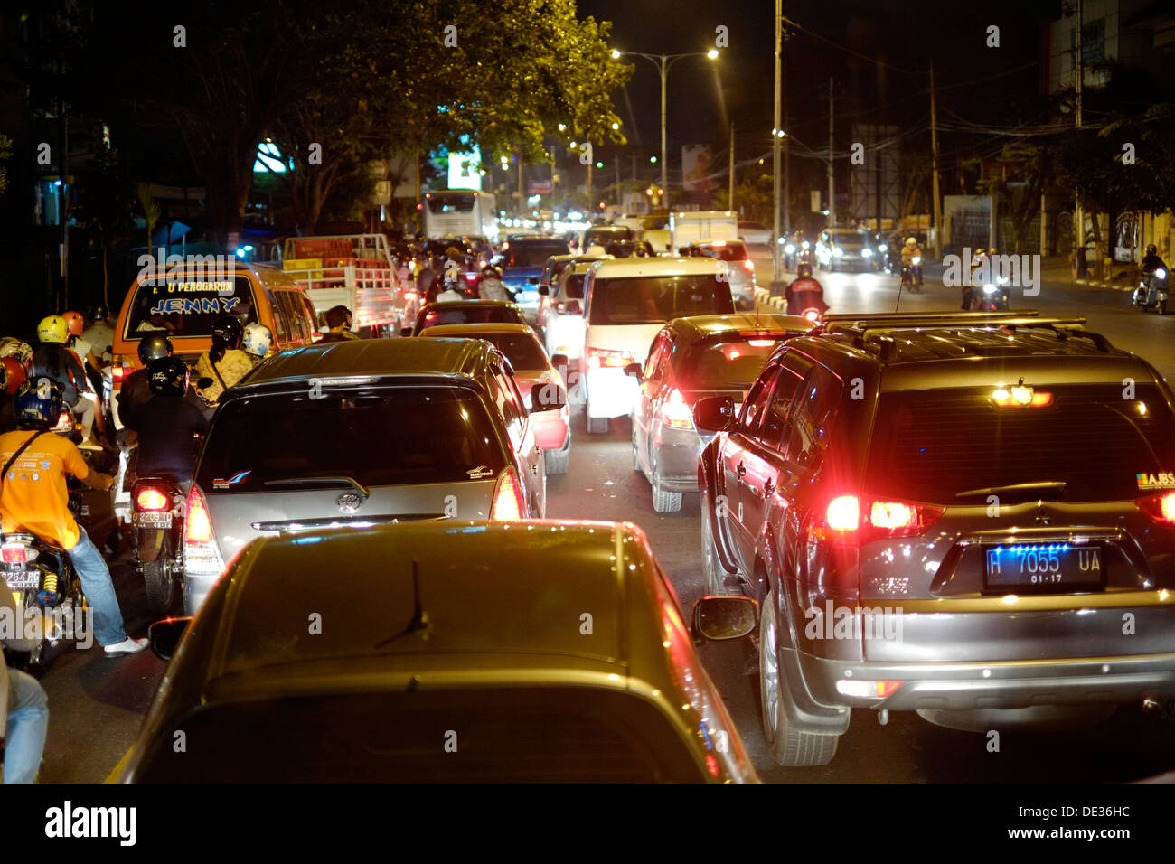 roads jammed with traffic even during the night as indonesians travel ...
