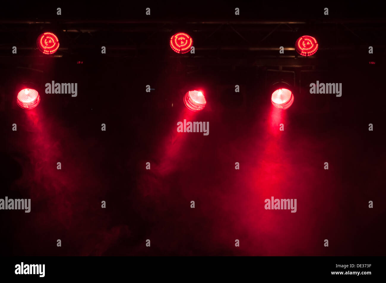 Red stage lights and smoke machine Stock Photo - Alamy