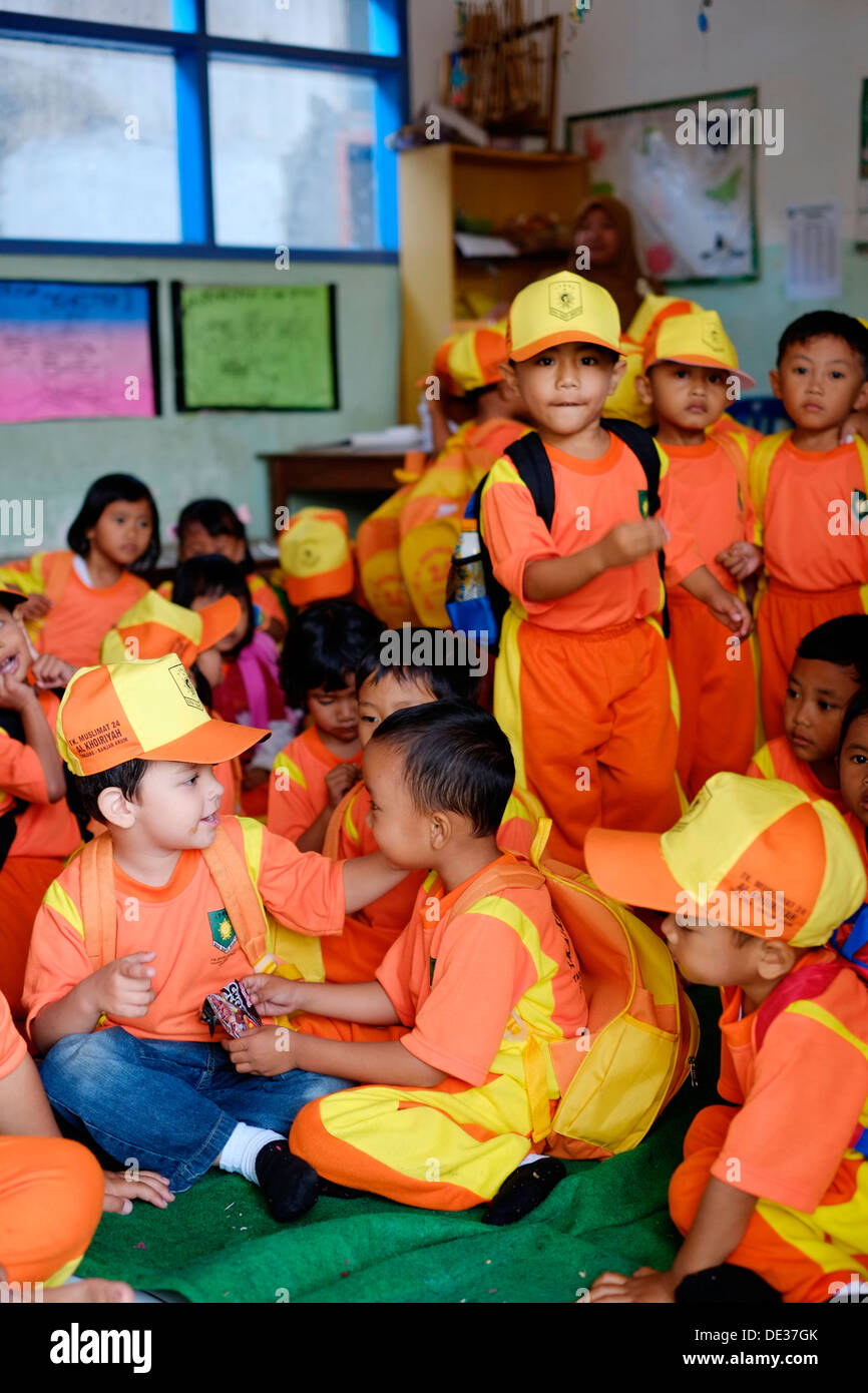 young local school children at their elementary school in java ...