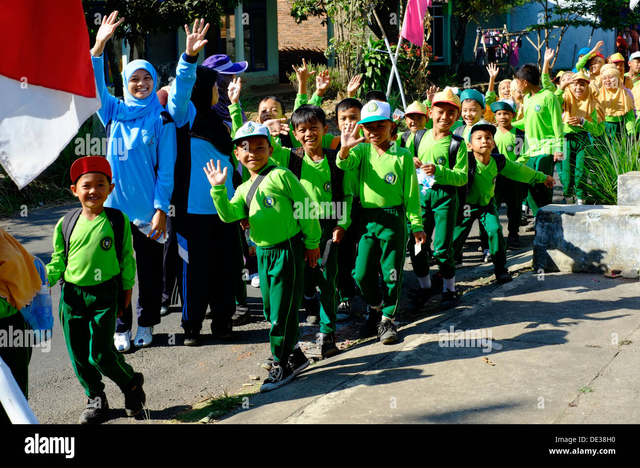 large group of school children on a freedom day for indonesia march ...