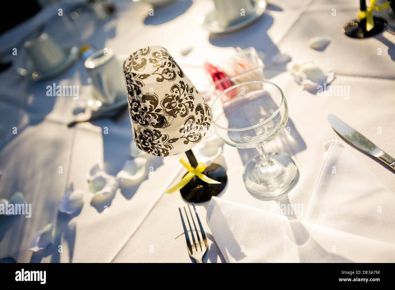 Wedding reception guest table setting Stock Photo - Alamy