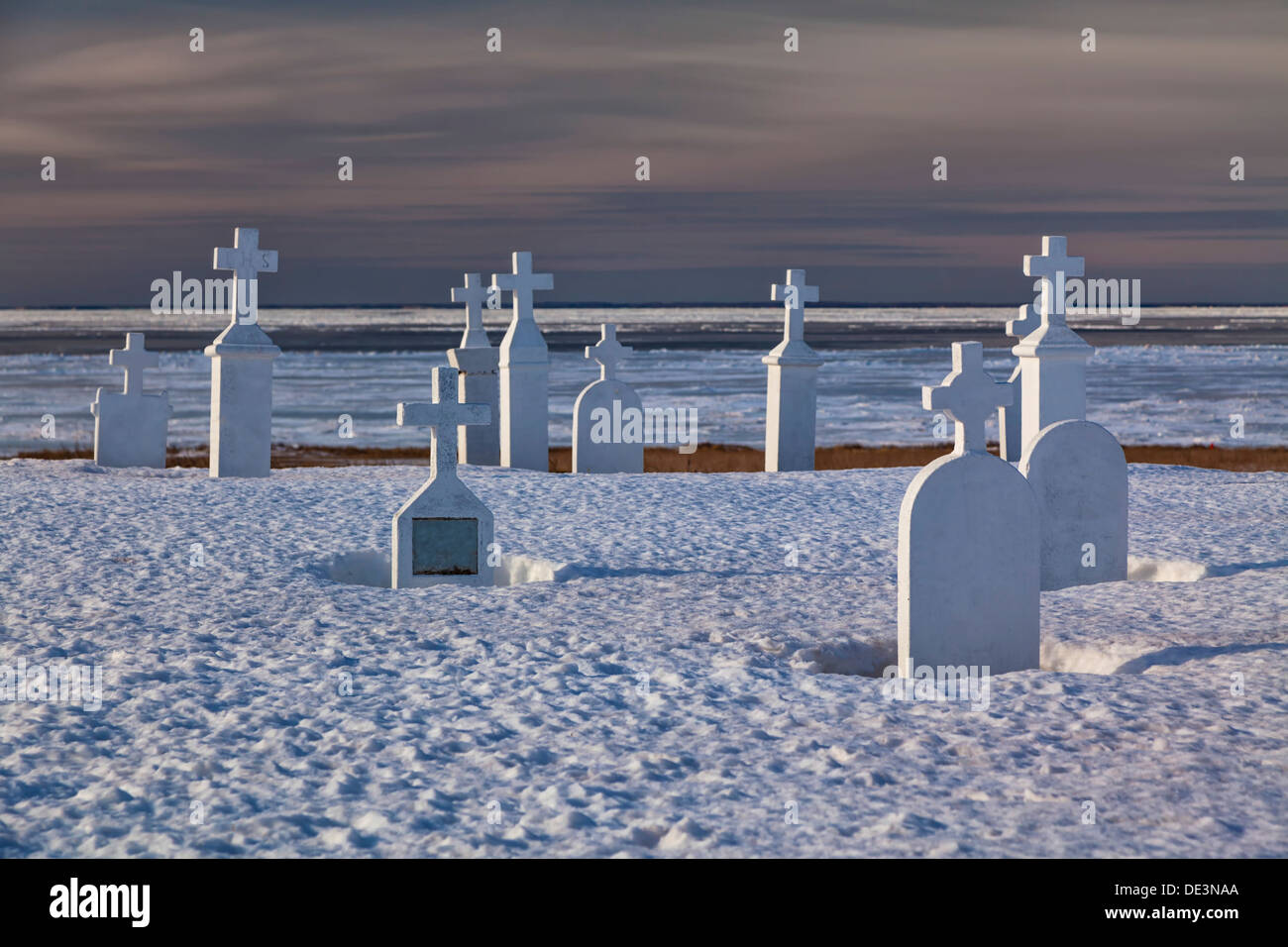 White tomb stones in a winter cemetery Stock Photo - Alamy