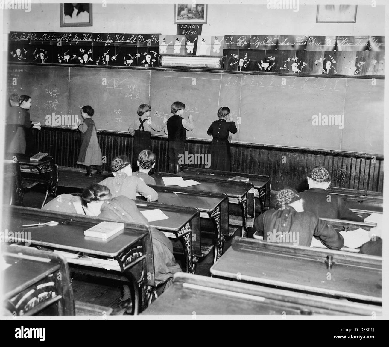This photograph captures a classroom scene in Lancaster County ...