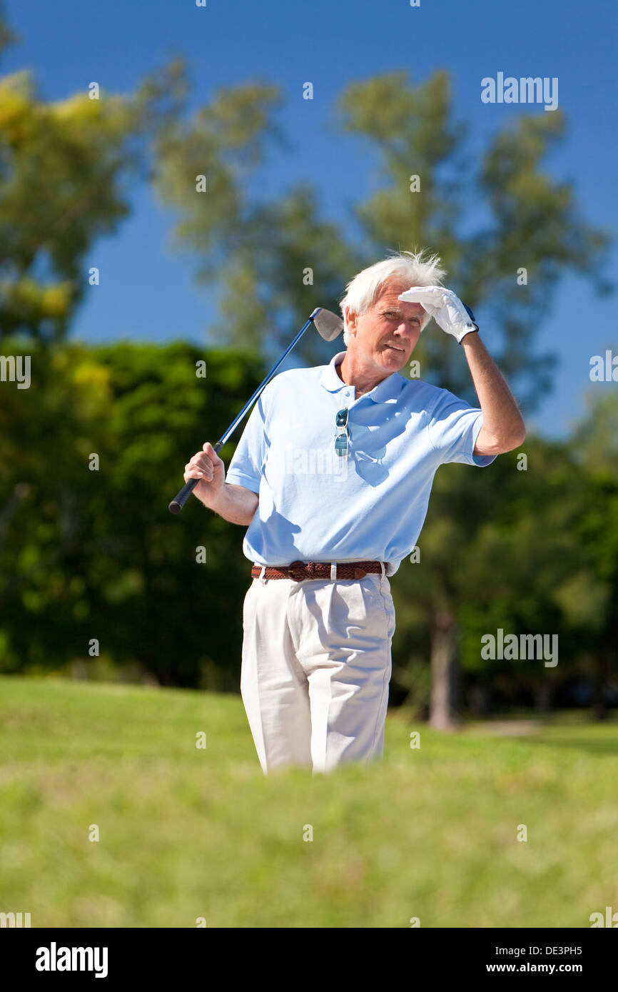 Old man playing golf hi-res stock photography and images - Alamy