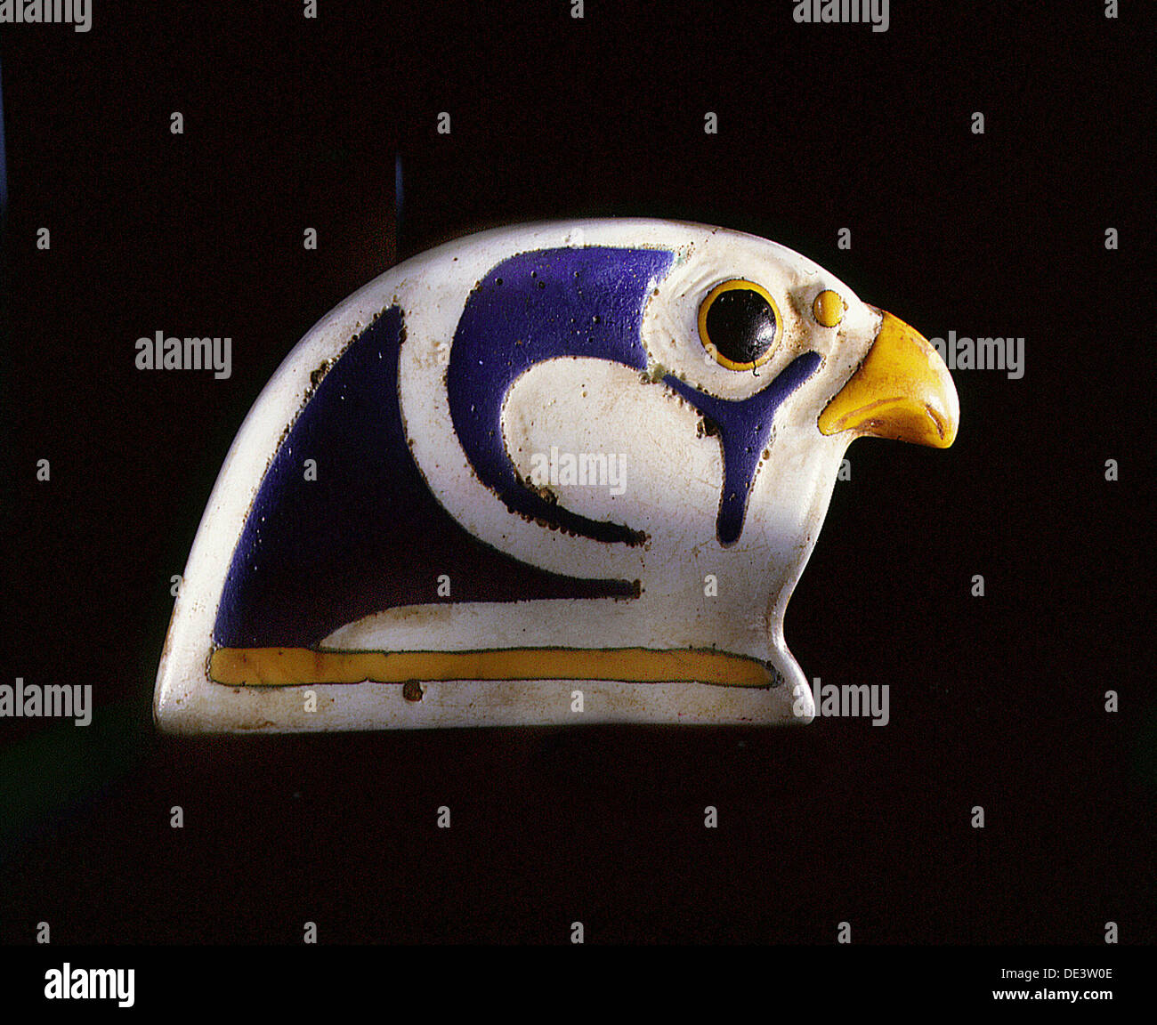 Glass falcon head, the terminal from a collar Stock Photo - Alamy