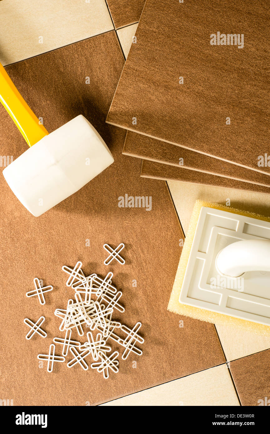 Flooring tools tiles, tile spacers Stock Photo - Alamy