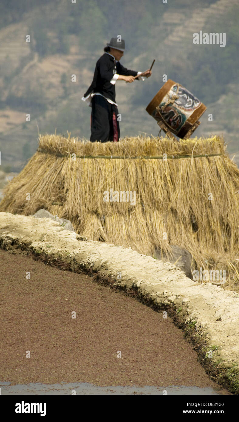 Chinese man beats hi-res stock photography and images - Alamy