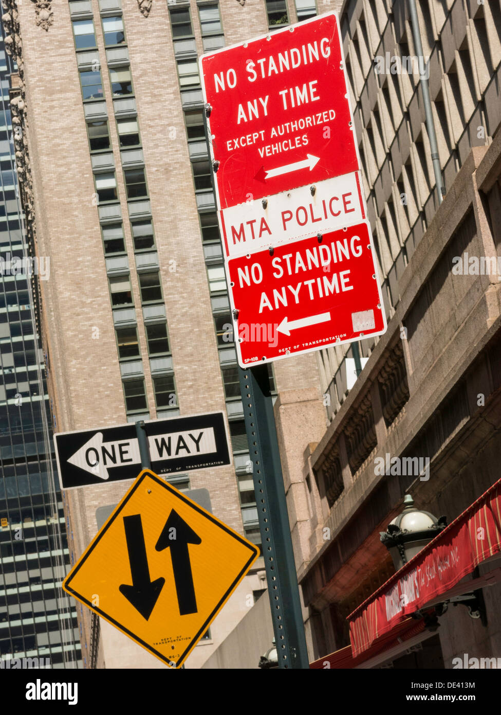 Traffic Signs with Confusing Arrows, NYC Stock Photo - Alamy